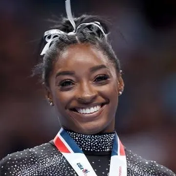 Chat with Simone Biles - text or voice, Enjoy AI Chat Free & Safe